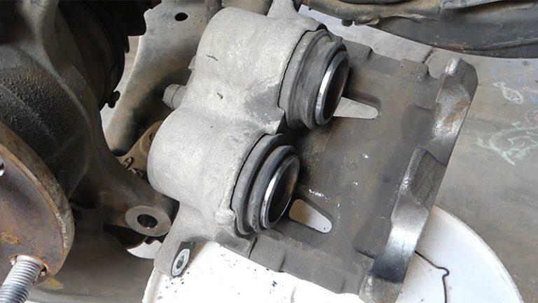 What Causes Brake Caliper Piston To Retract? - Brake Pad Boss